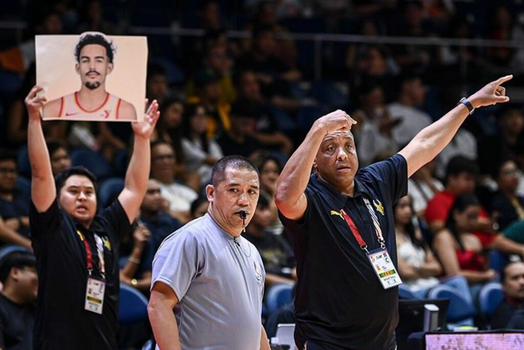 FEU coach Chambers uses placards for calling plays - BusinessWorld Online